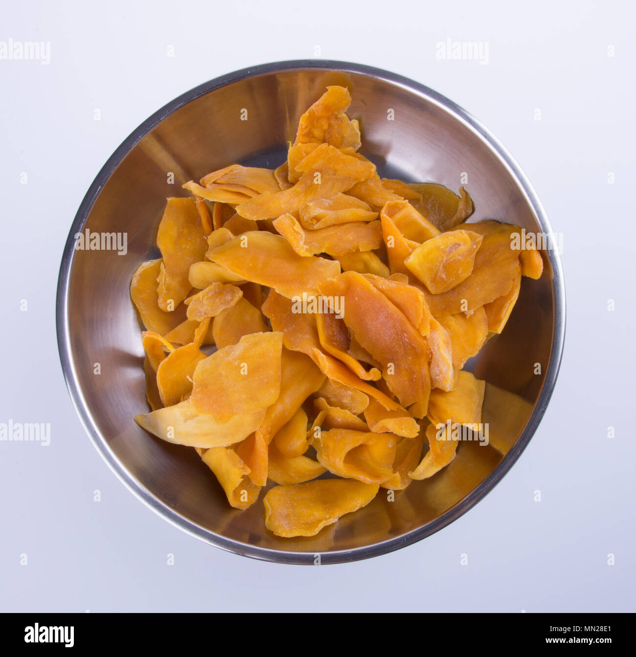 mango dry or dried mango slices on background Stock Photo - Alamy