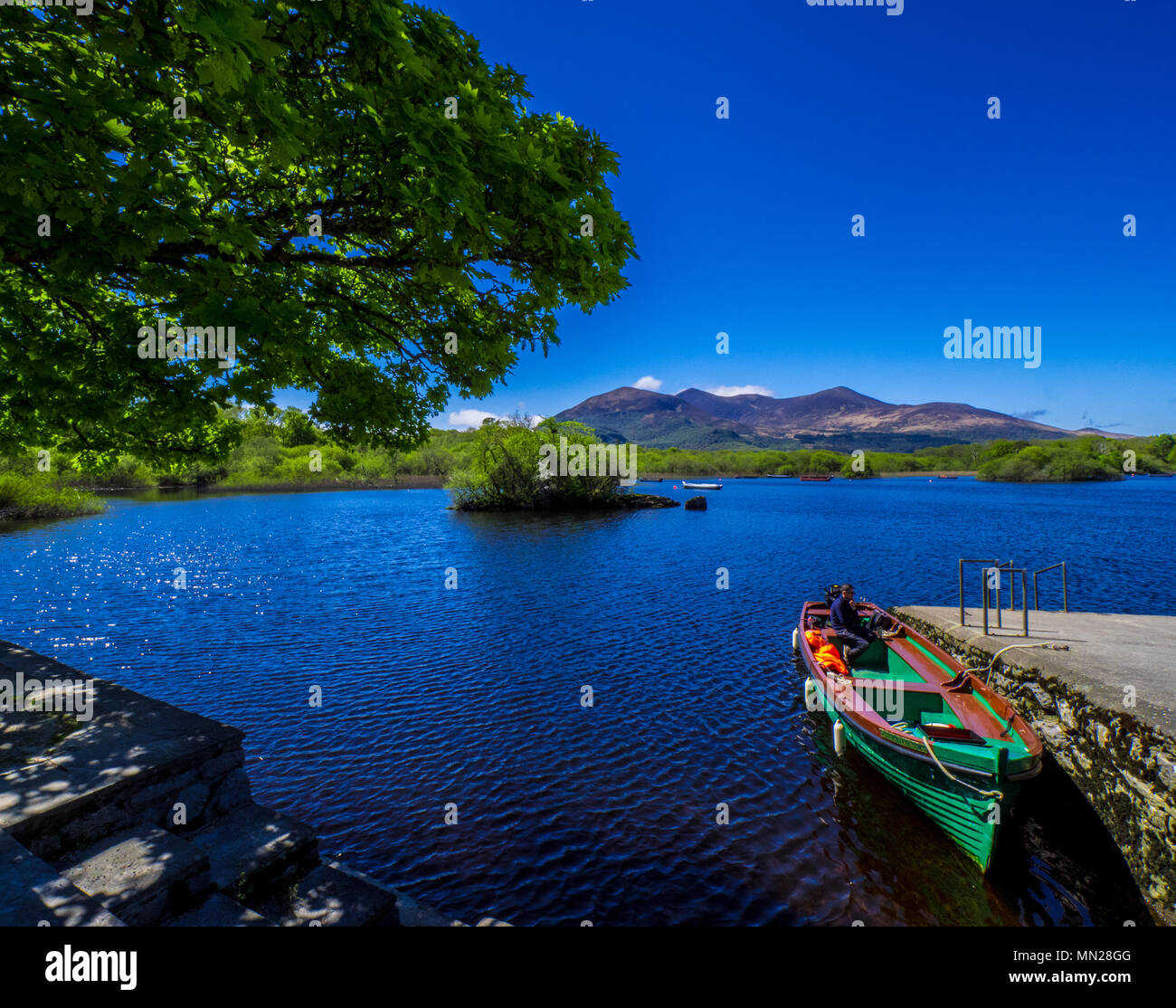 Amazing deep blue lake at Killarney National Park - an idyllic romantic ...