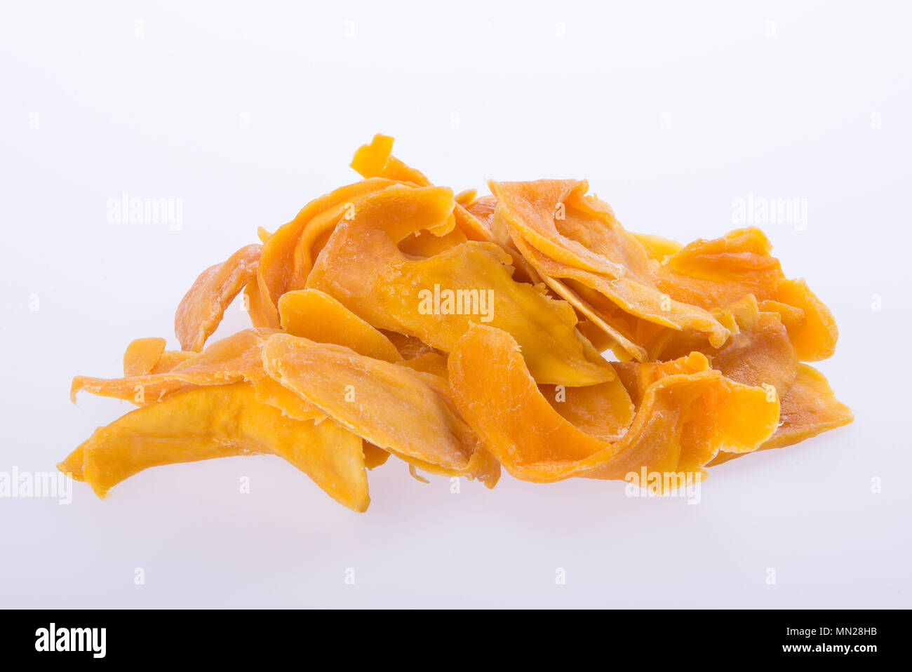 mango dry or dried mango slices on background Stock Photo - Alamy