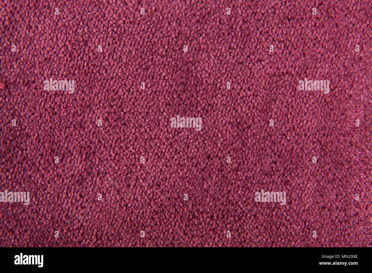 fabric texture magenta carpeting for background Stock Photo - Alamy