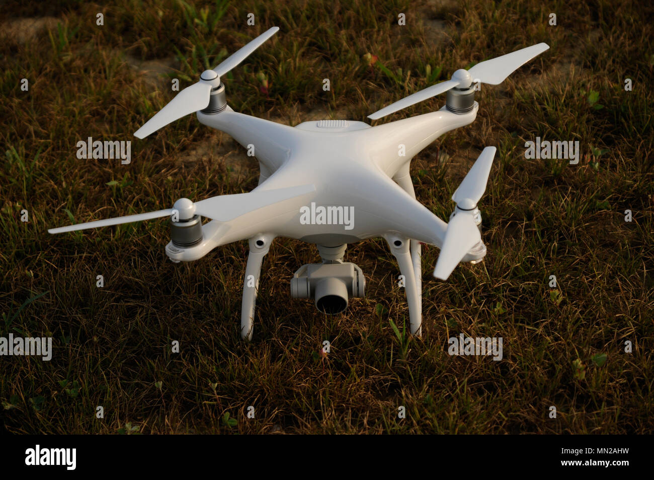 Drone on the ground preparing to take off Stock Photo - Alamy