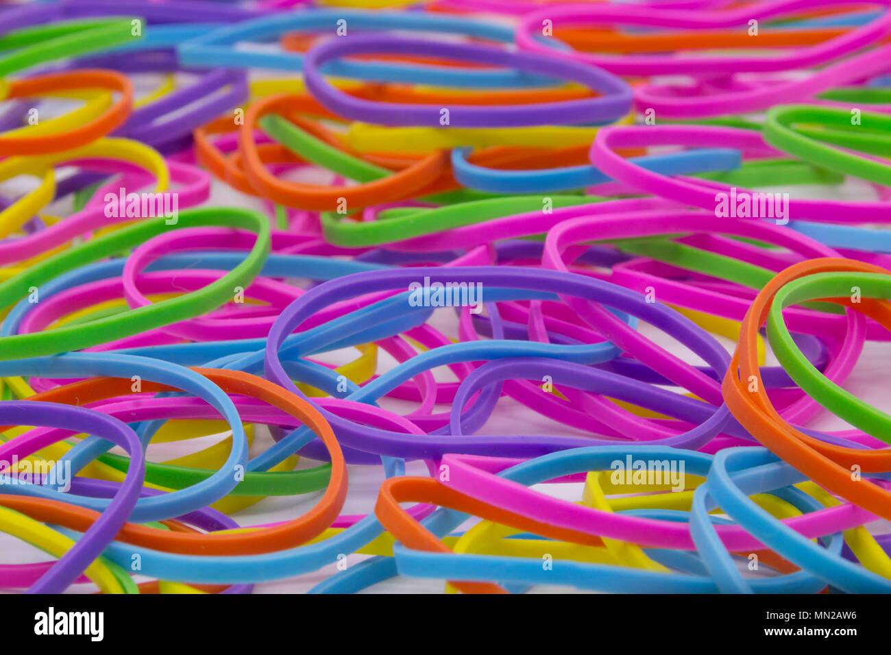 Colorful neon elastic / rubber bands Stock Photo - Alamy