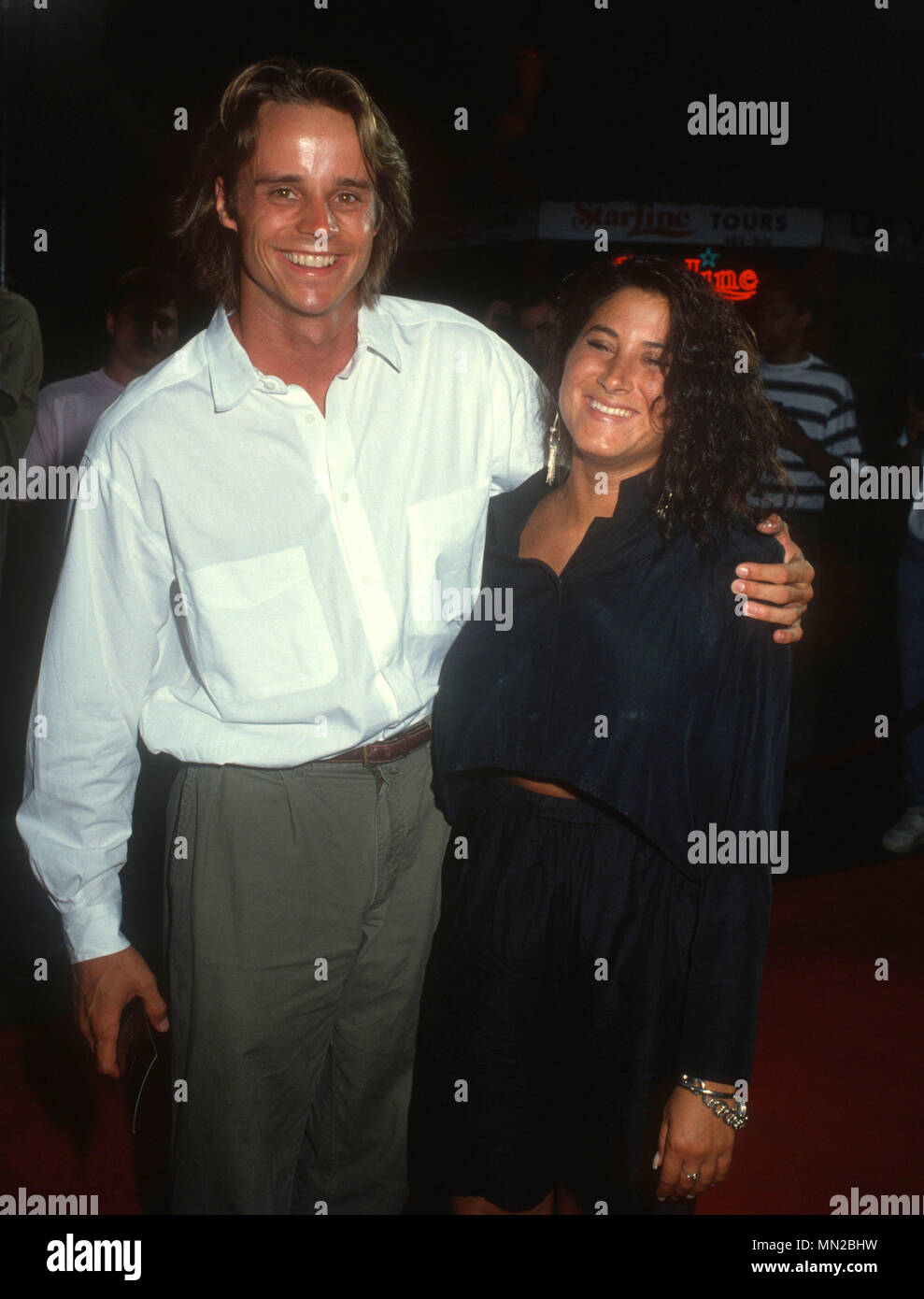 HOLLYWOOD, CA - AUGUST 06: Actor Mitchell Anderson (L) and guest attend ...