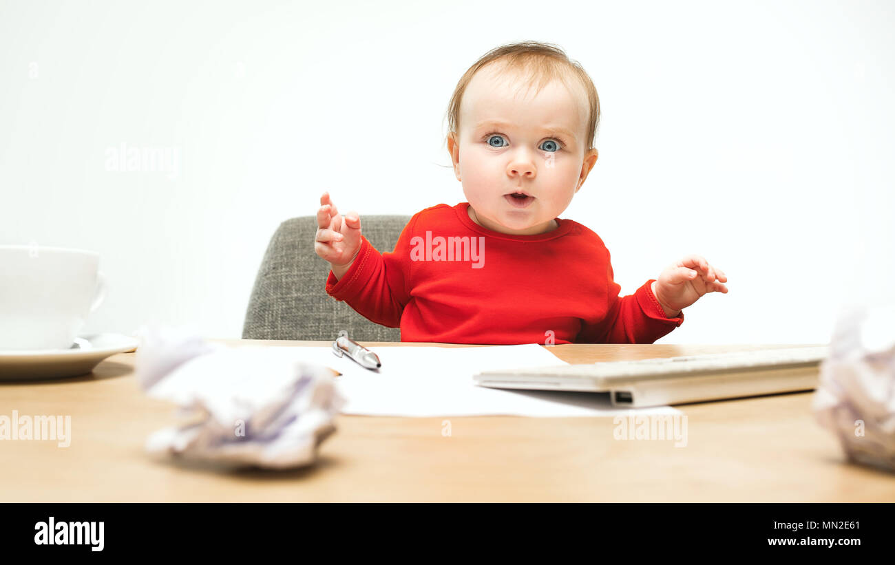 Happy child baby girl toddler sitting with keyboard of computer ...