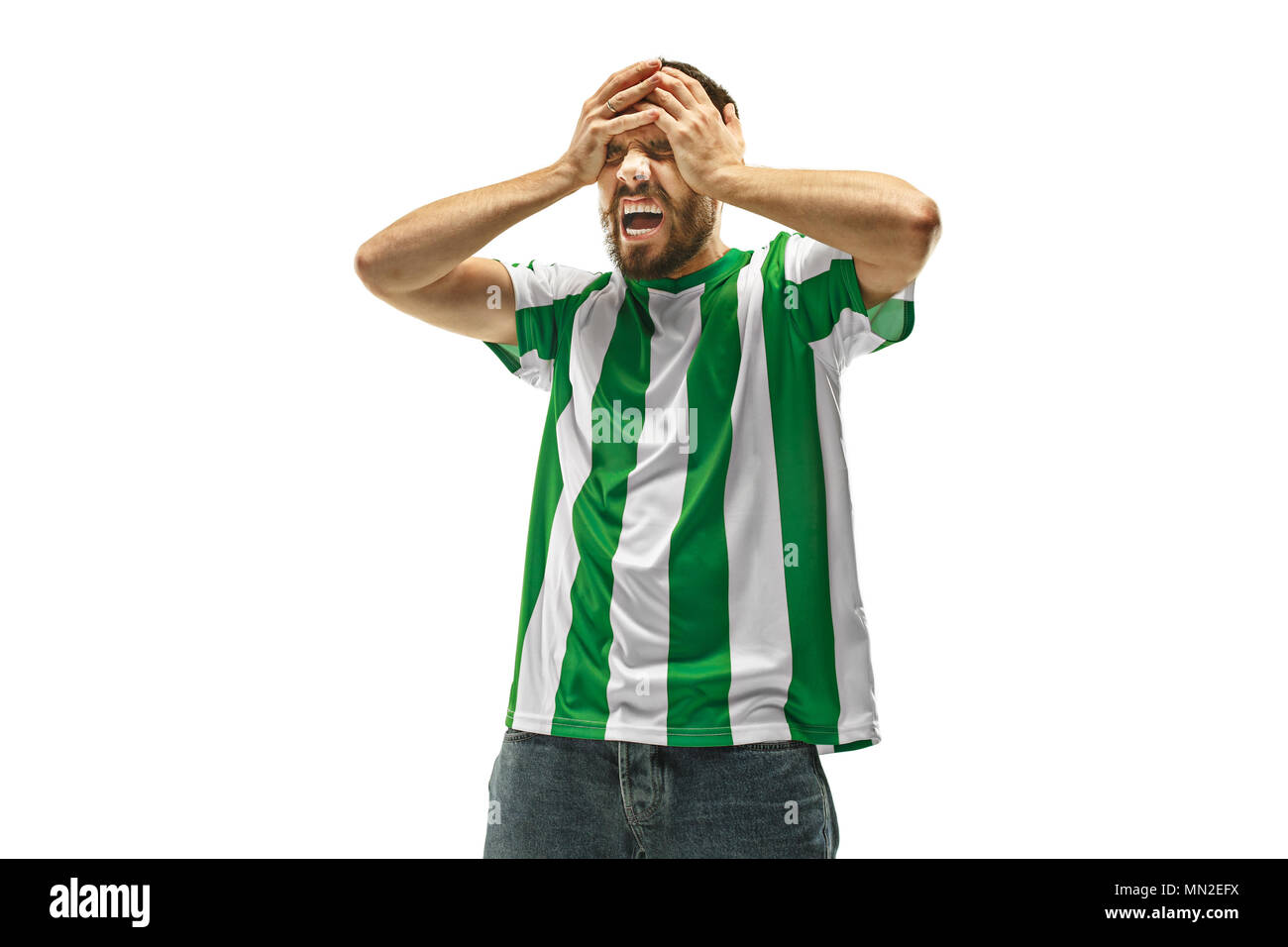 The unhappy and sad Irish fan on white background Stock Photo - Alamy