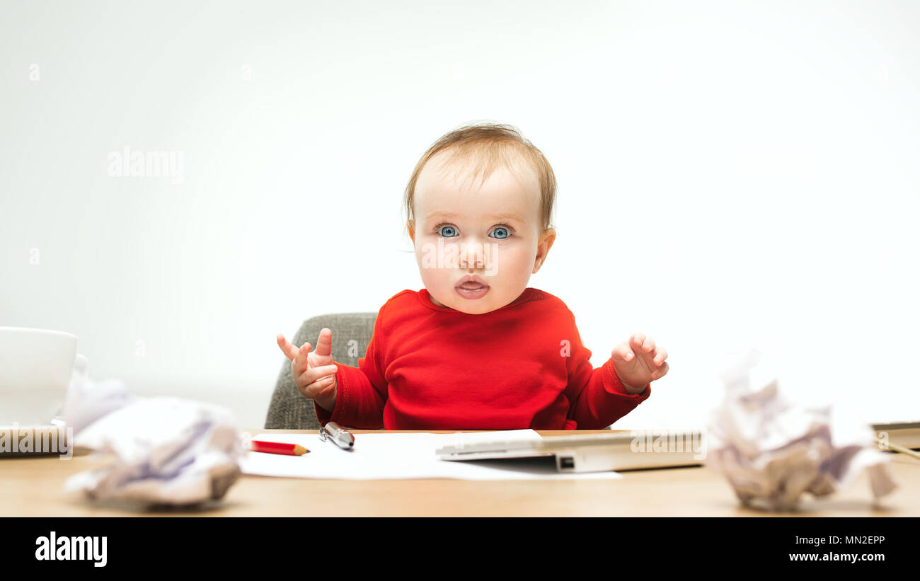 Happy child baby girl toddler sitting with keyboard of computer ...