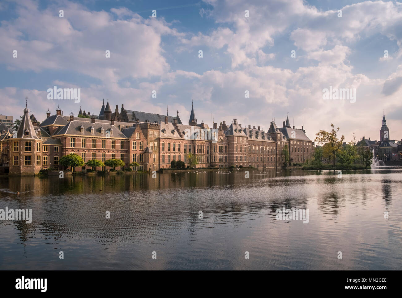 Exterior of Binnenhof parliament building and Hofvijver lake, landmark ...