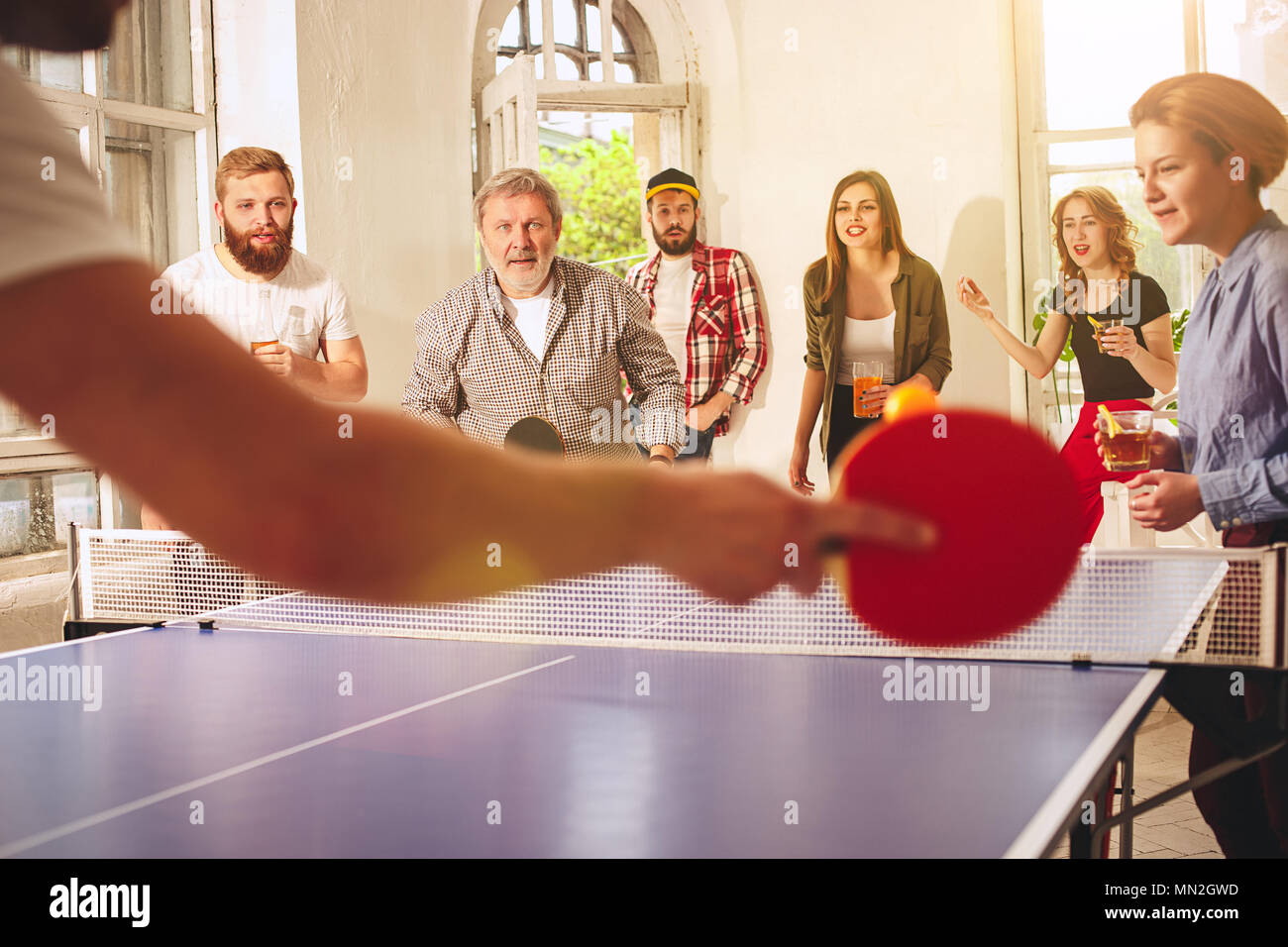 Cute girl playing table tennis hi-res stock photography and images - Alamy