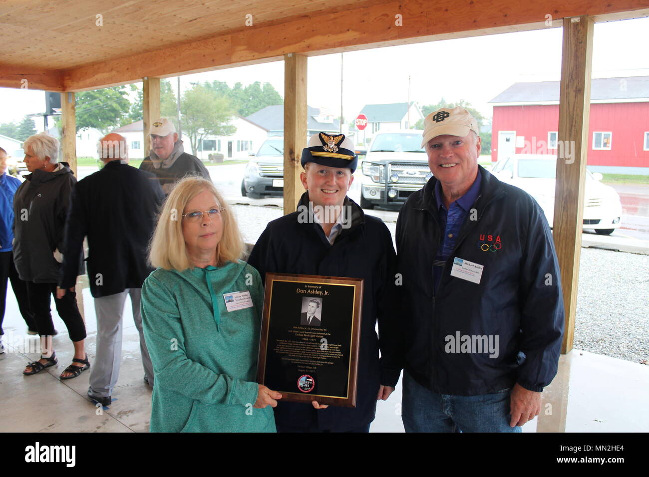 Linda Ashley VandenHeuvel and Michael Ashley, joined by Coast Guard ...