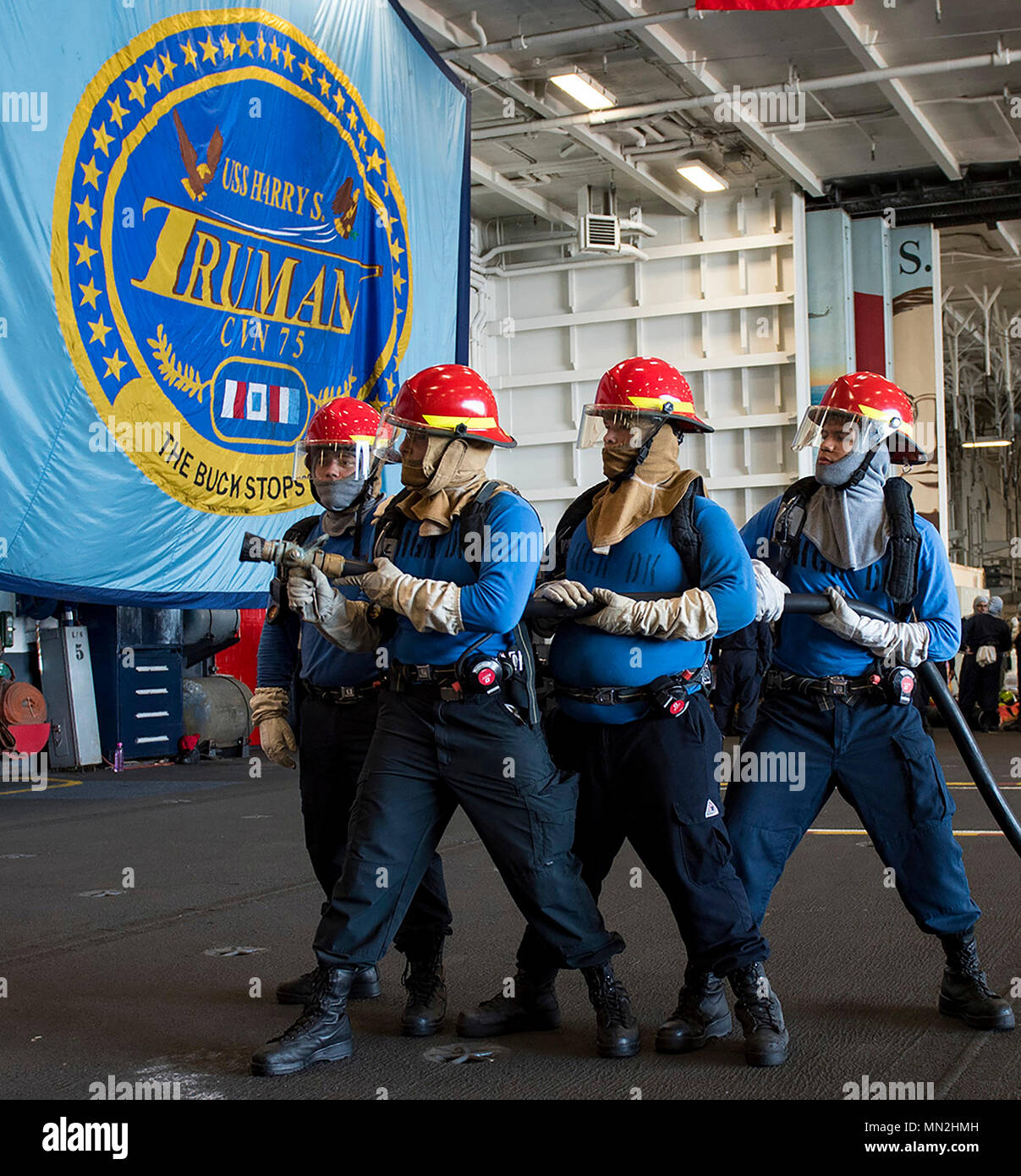 Firefighting hose handling techniques hi-res stock photography and ...