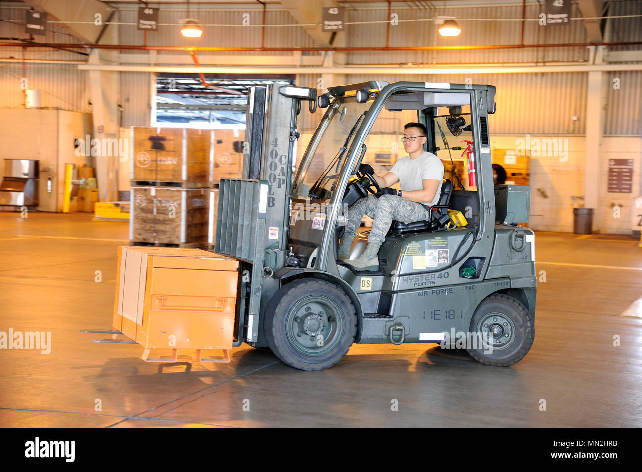 U.S. Air Force Airman Christopher Lee, an air transportation specialist ...