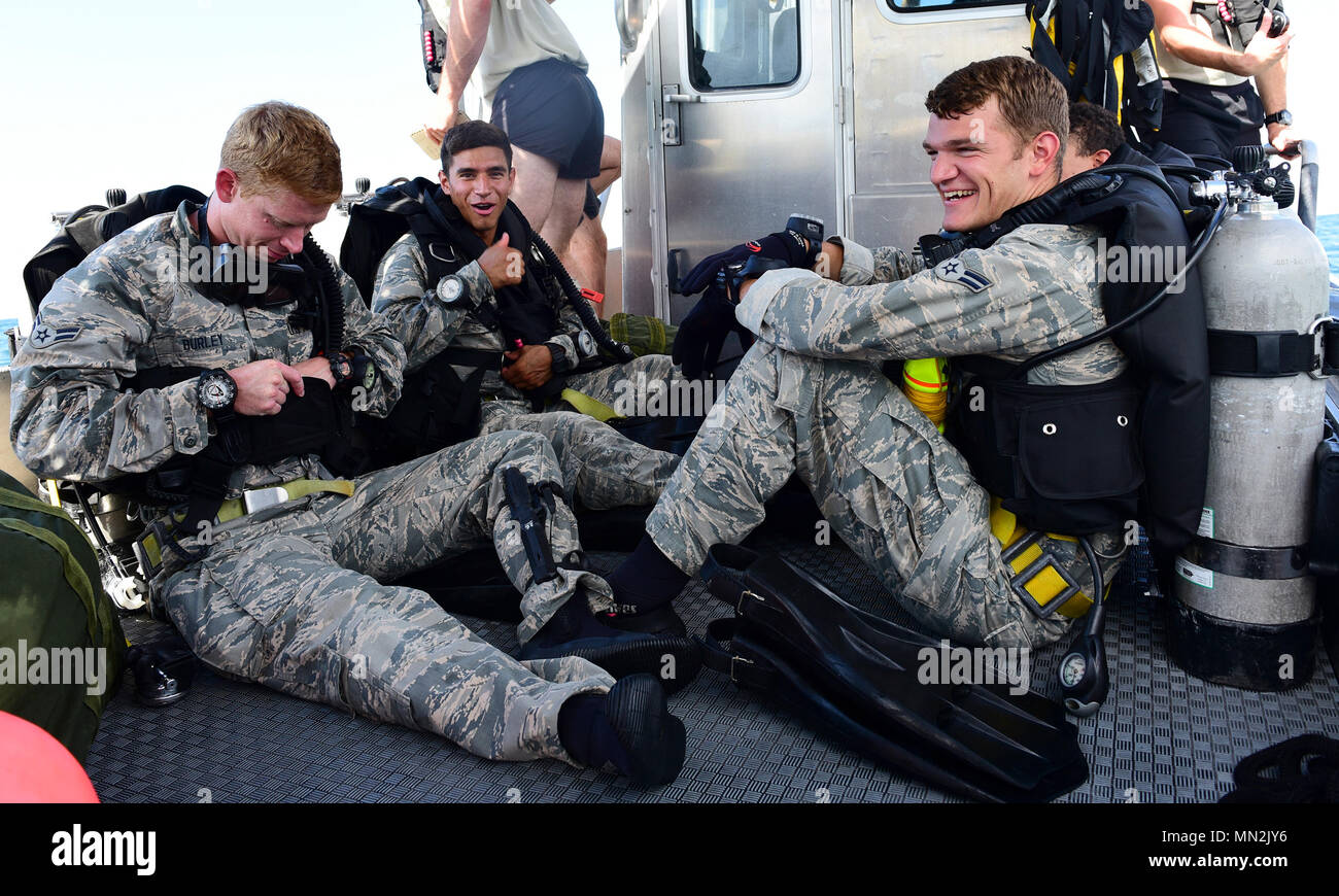 U.S. Air Force diving students joke with one another before a training ...