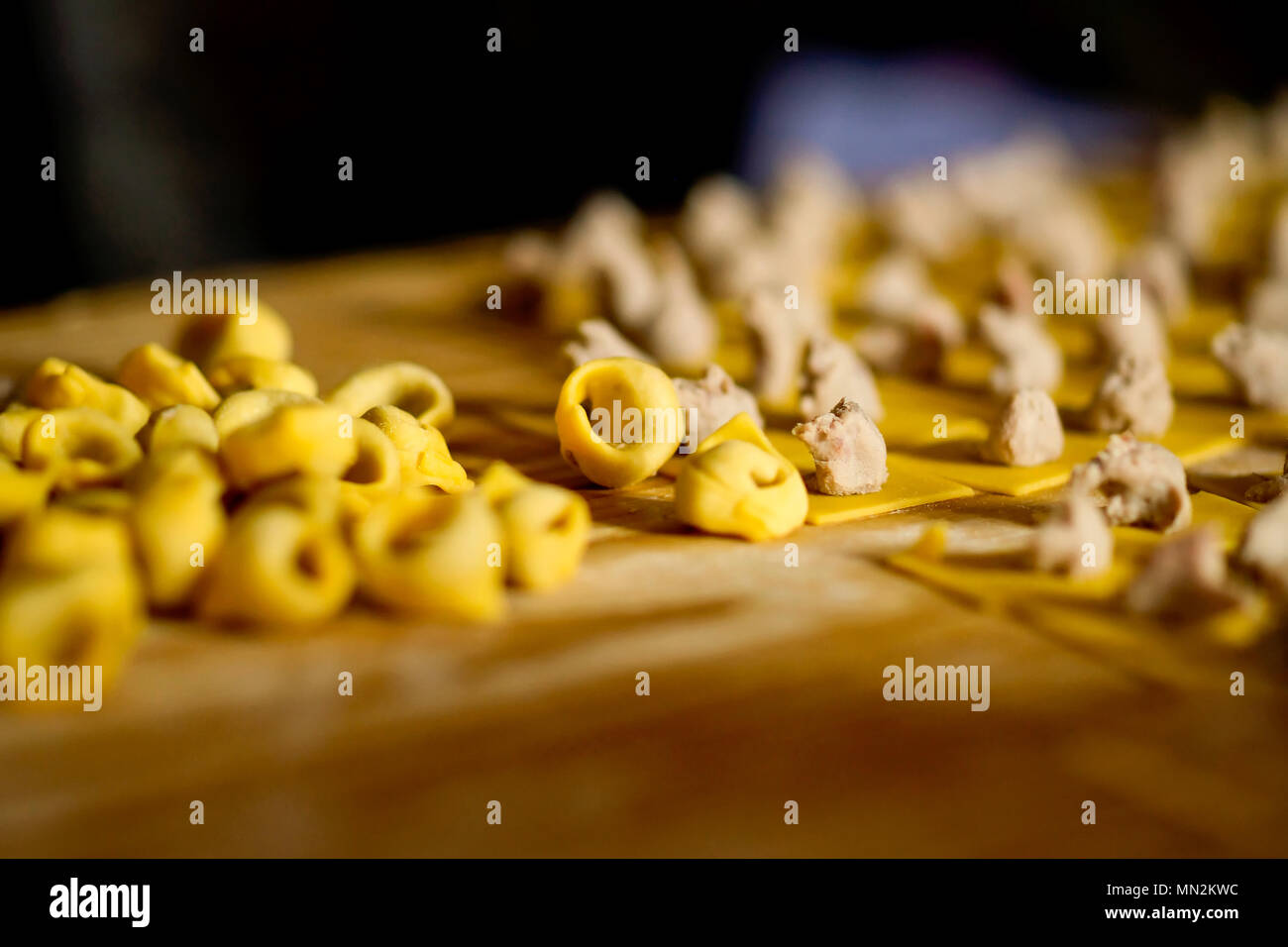 Tortellini, preparation of the traditional home made pasta of Modena ...