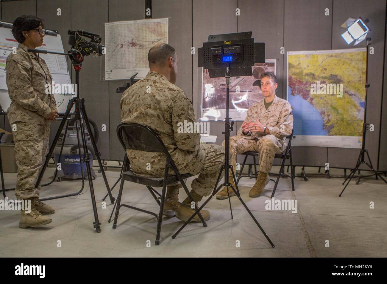 U.S. Marine Corps Chief Warrant Officer 3 Paul S. Mancuso, center ...