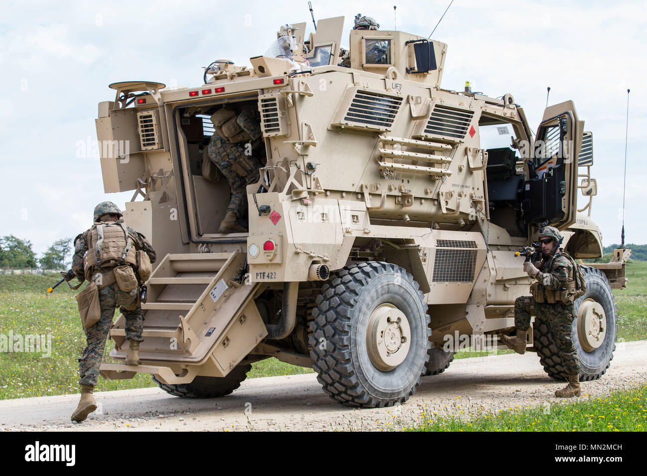 HOHENFELS, Germany -- U.S. Marines Sgt. Robert Vandenburgh (left), a ...