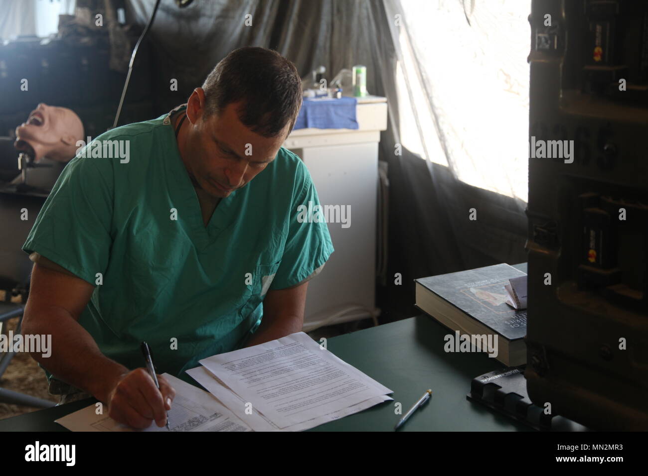 U.S. Army Lt. Col. Evan Hart of the 143rd Dental Company, 328 Battalion ...
