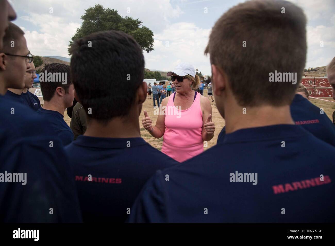 Gretchen Mack, mother of Chance Phelps, speaks to Marine Corps poolees ...