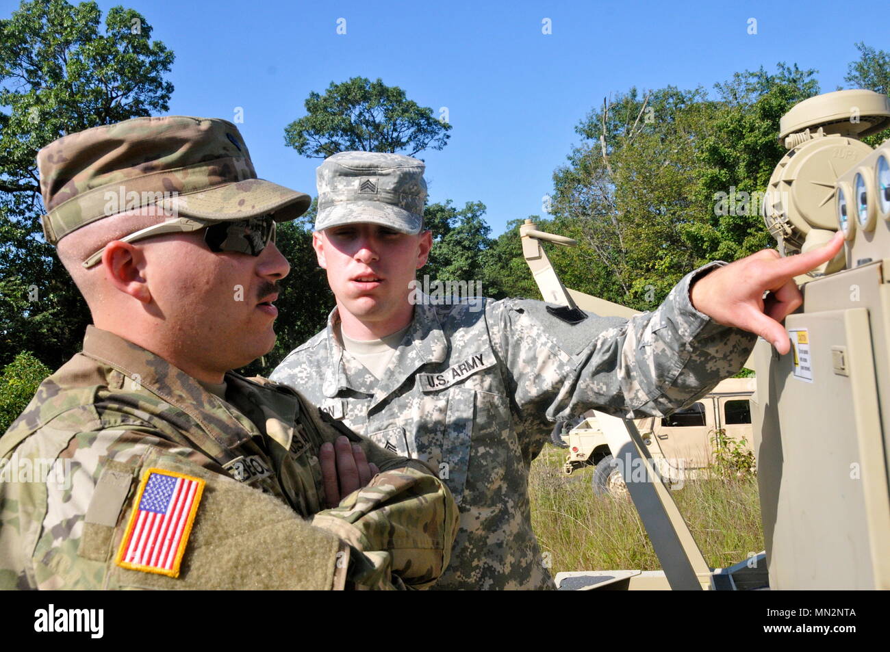 U.S. Army Spc. Greg Ebersol, left, and Sgt. James Derrickson, signal ...