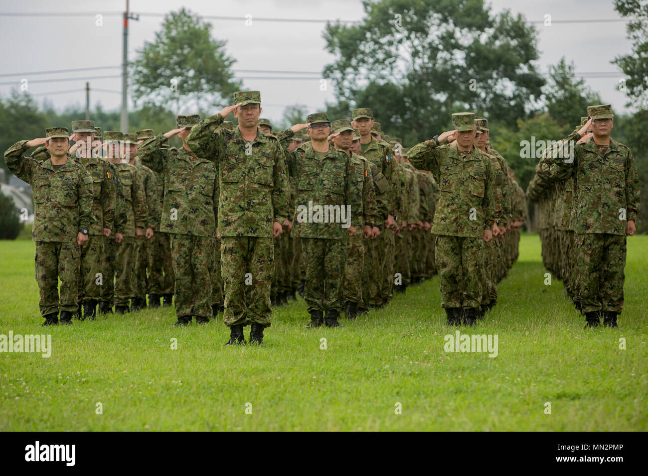 U.S. Marine Corps color guard commander and Japanese Ground Self ...