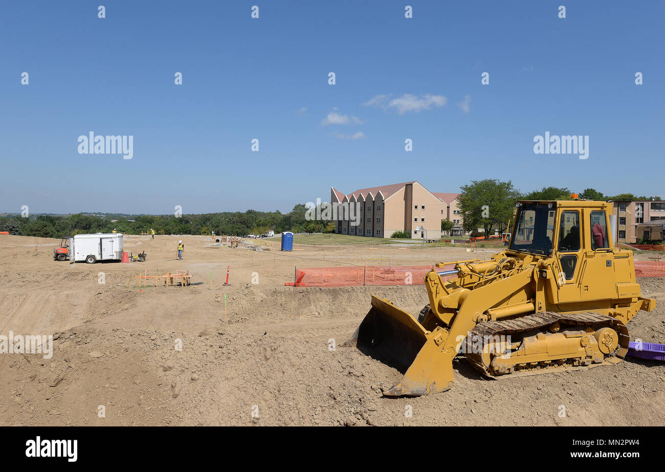 Carpenters With The Ls Black Constructors Company Work On The Footing Foundation Of The New