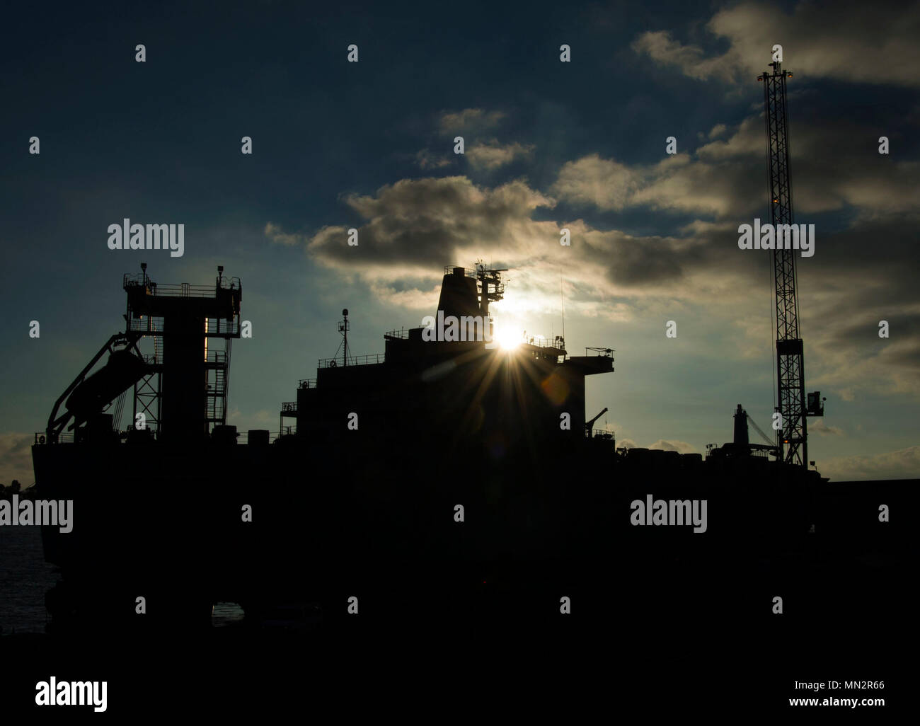 The USS Cape Isabel stands by for off loading at the Port of San Diego ...