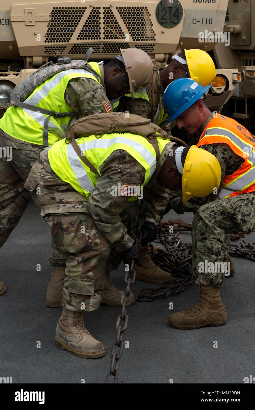 U.S. Navy Seamen from the Navy Cargo Handling Battalion One and U.S ...