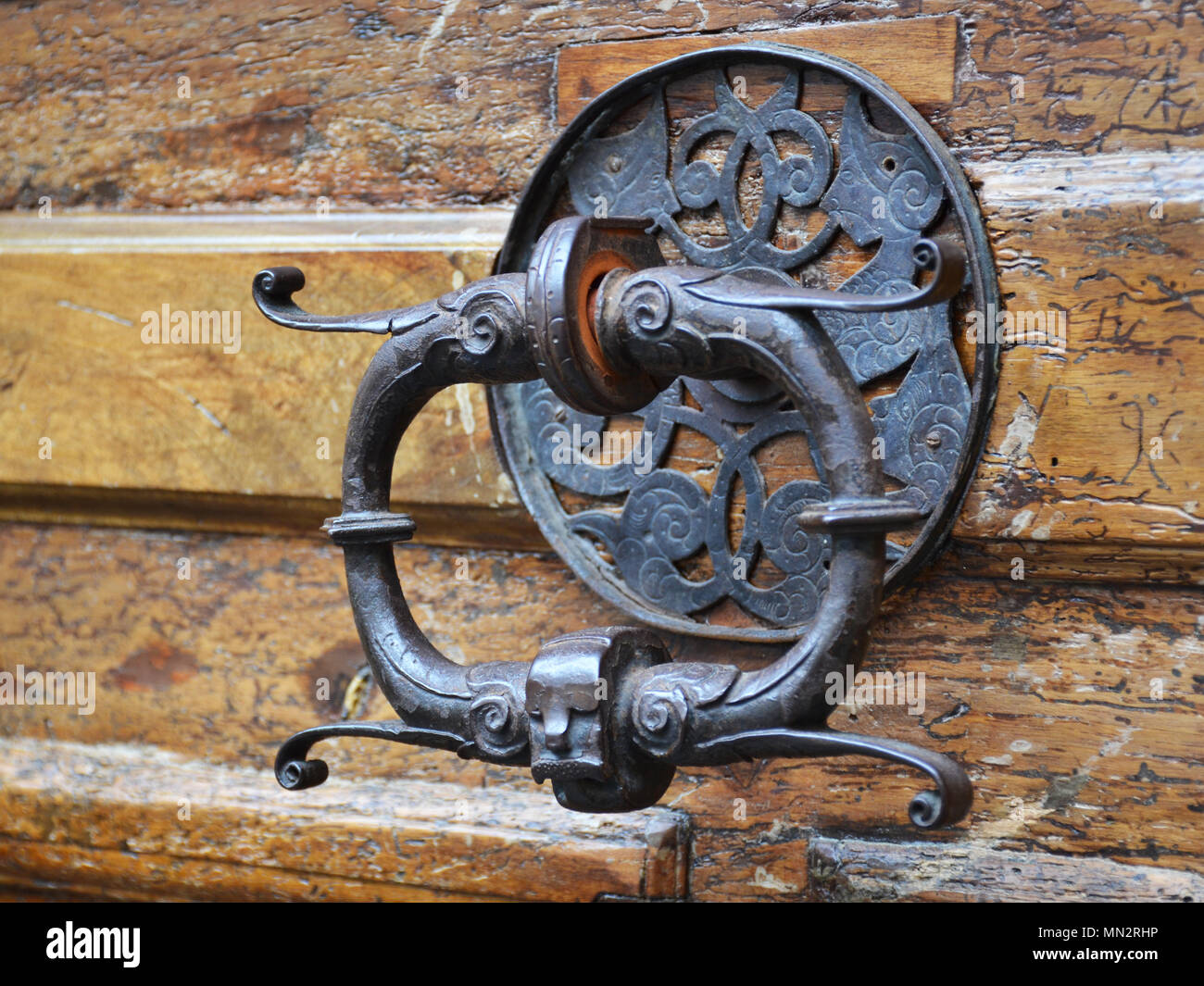 Old metal door handle Stock Photo - Alamy