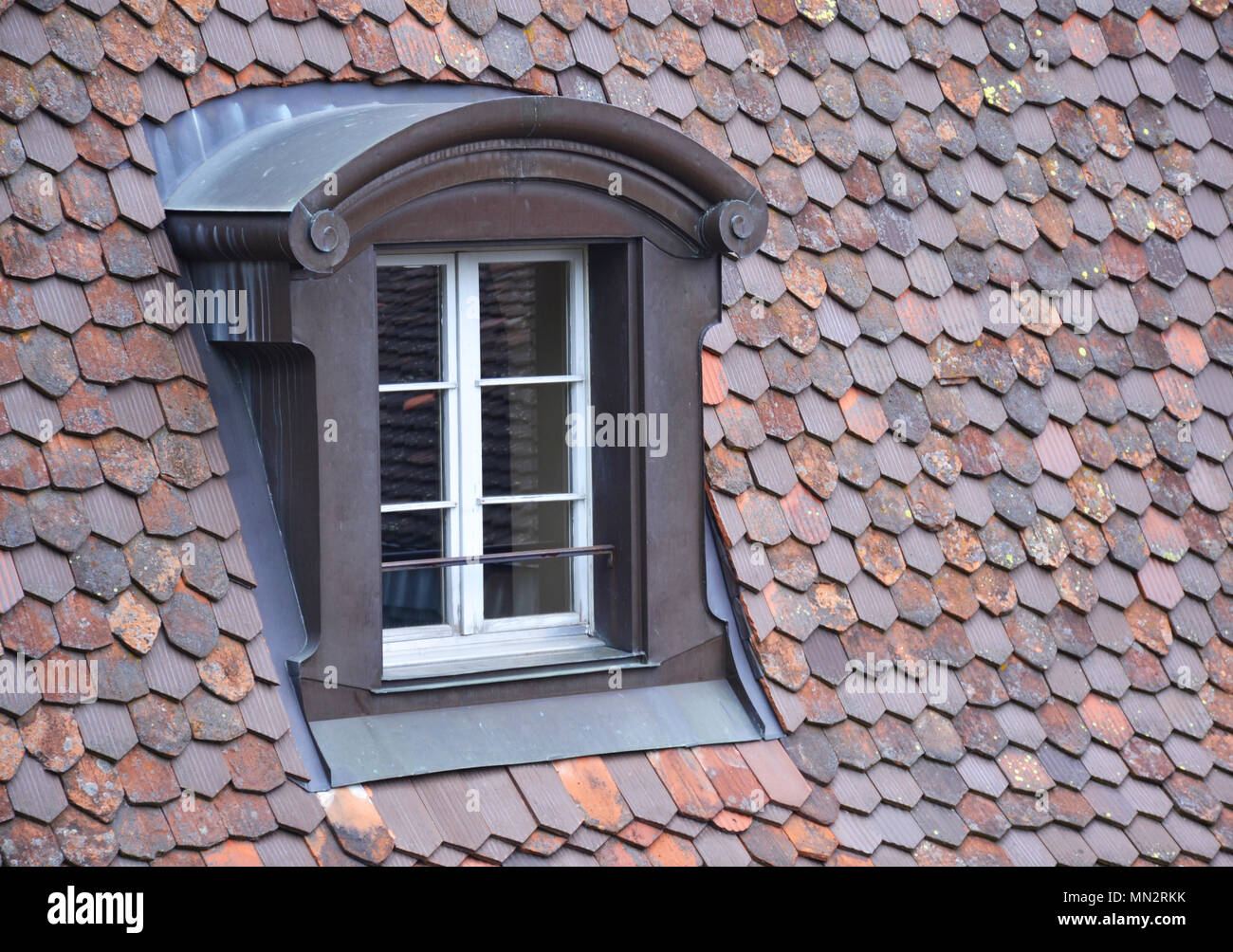Old window on a roof Stock Photo - Alamy