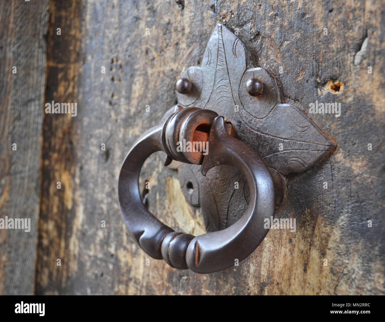 Old metal door handle Stock Photo - Alamy