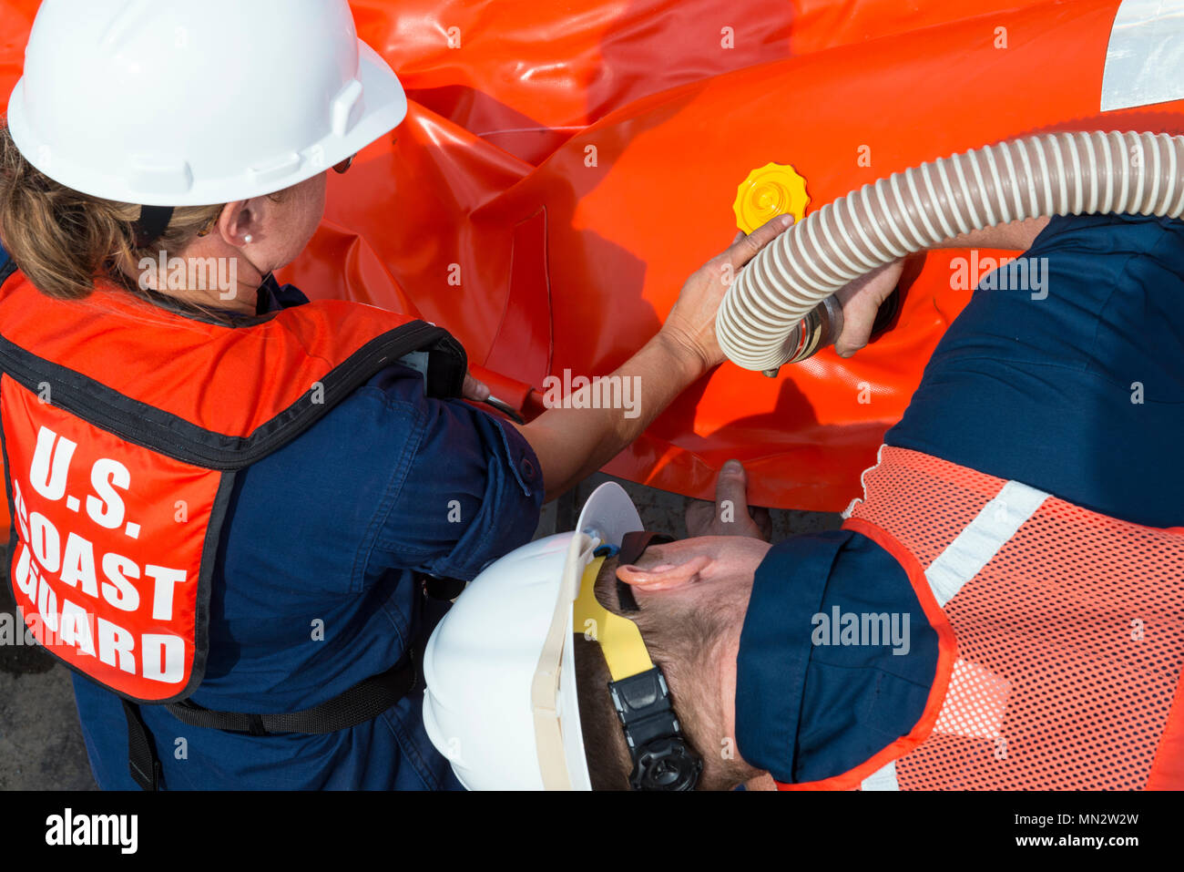 U.S. Coast Guard Crew members from the Atlantic Strike Team, Sector ...