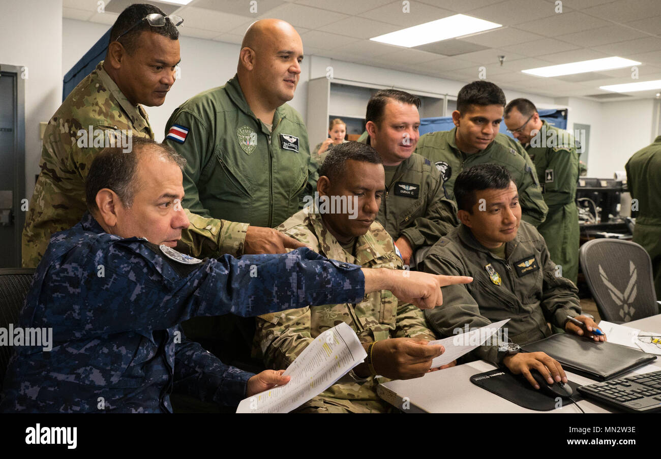 Service members from partner nation air forces work together during ...