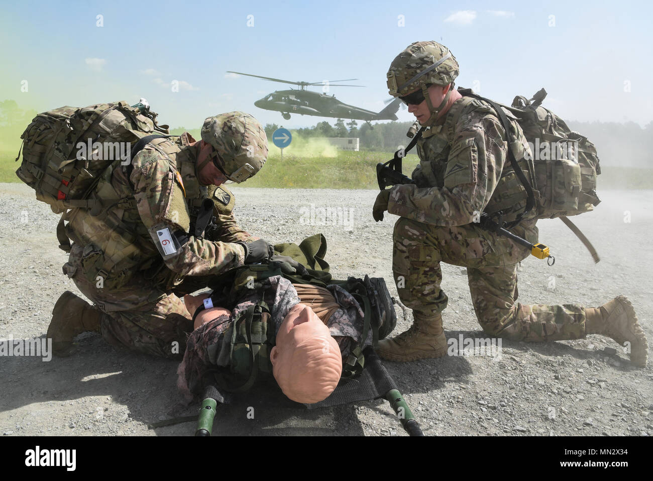 U.S. Army 1st Lt. Brian Teachout, left, with 21st Theater Sustainment ...