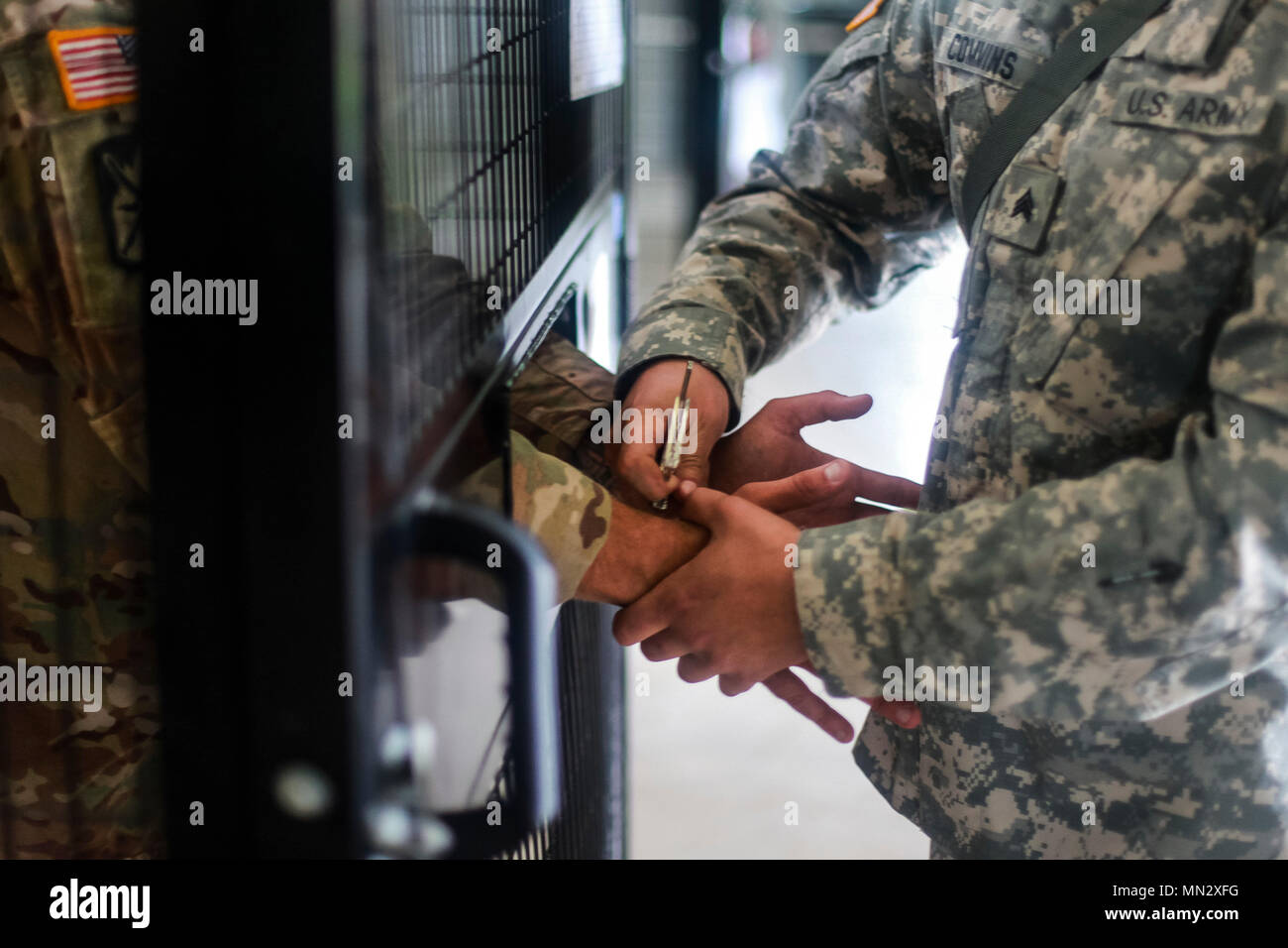 A U.S. Army Reserve milistary police Soldier assigned within the 300th ...