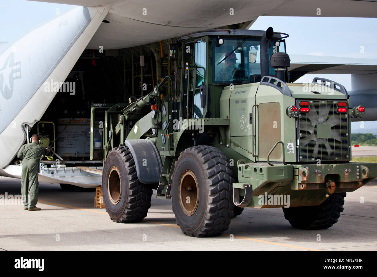 U.S. Marine Sgt. Andrew J. Miller, the embark chief with the Command ...
