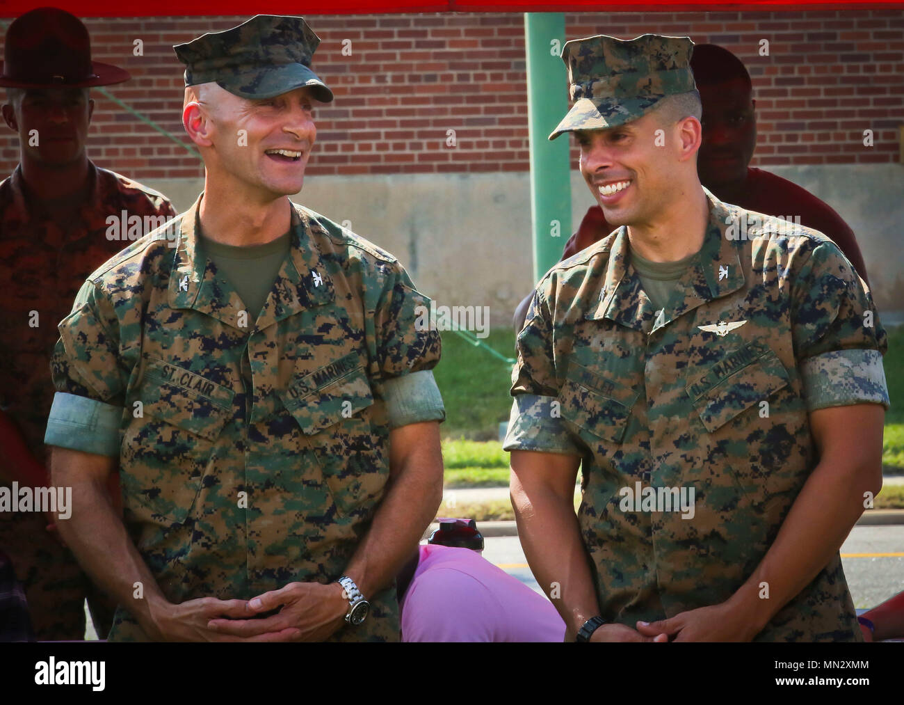 Col. Matthew St. Clair (left) and Col. Timothy P. Miller (right) talk ...