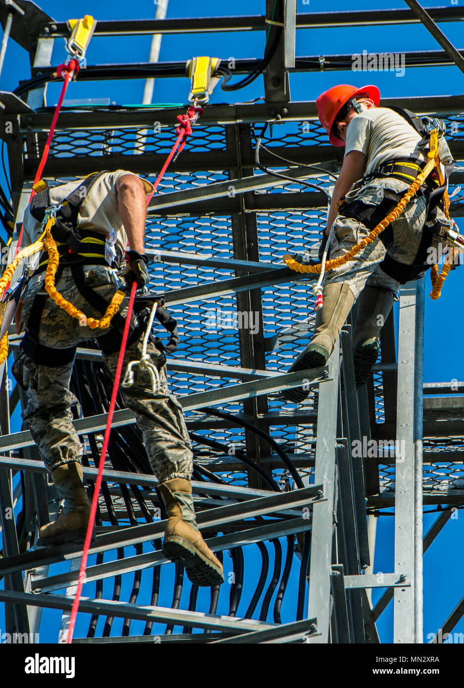 Airmen from the 375th Air Mobility Wing, Communications Squadron cable ...