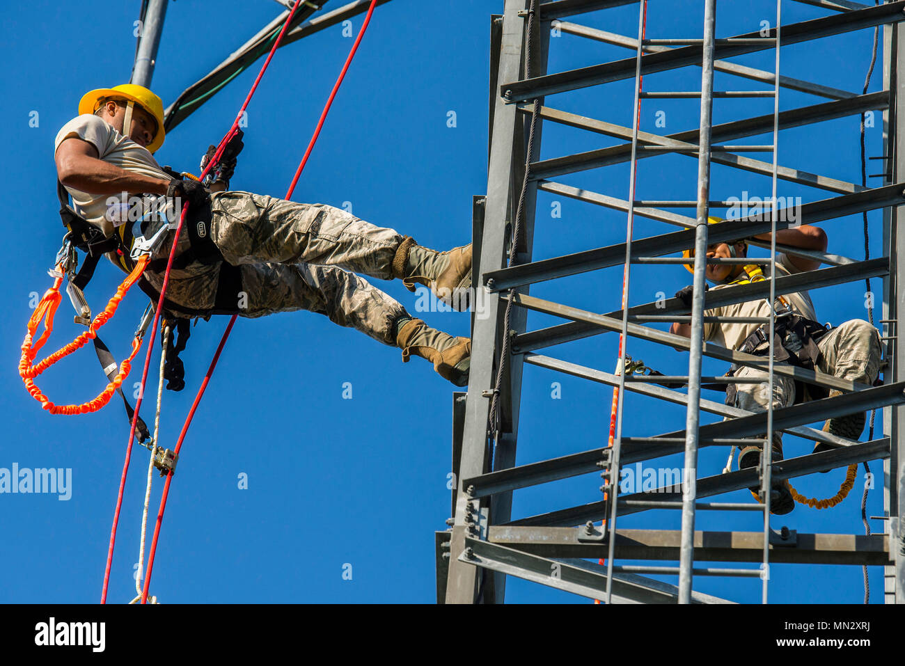 Airmen from the 375th Air Mobility Wing, Communications Squadron cable ...