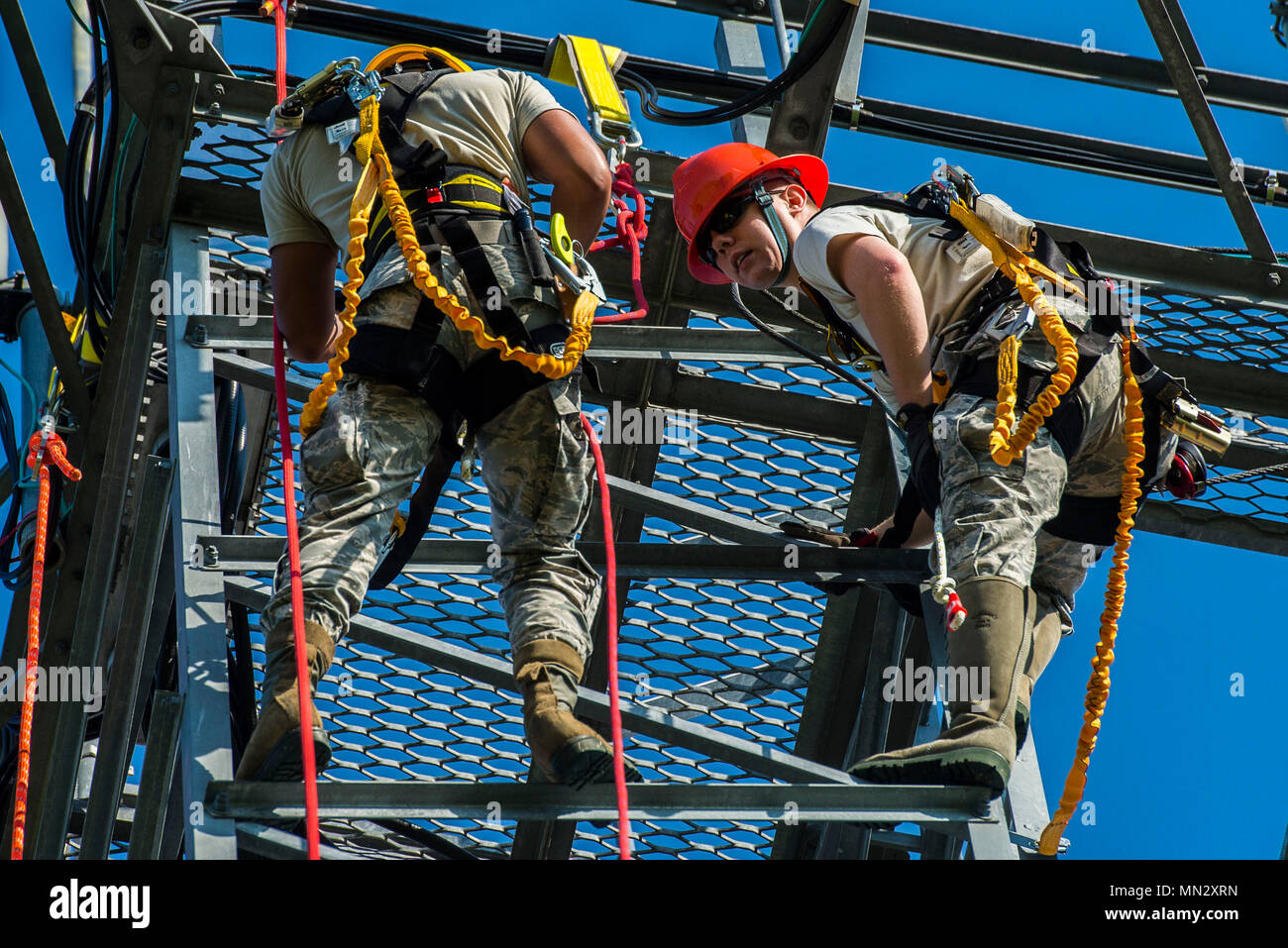 Airmen from the 375th Air Mobility Wing, Communications Squadron cable ...