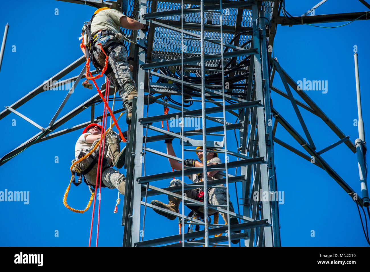 Airmen from the 375th Air Mobility Wing, Communications Squadron cable ...