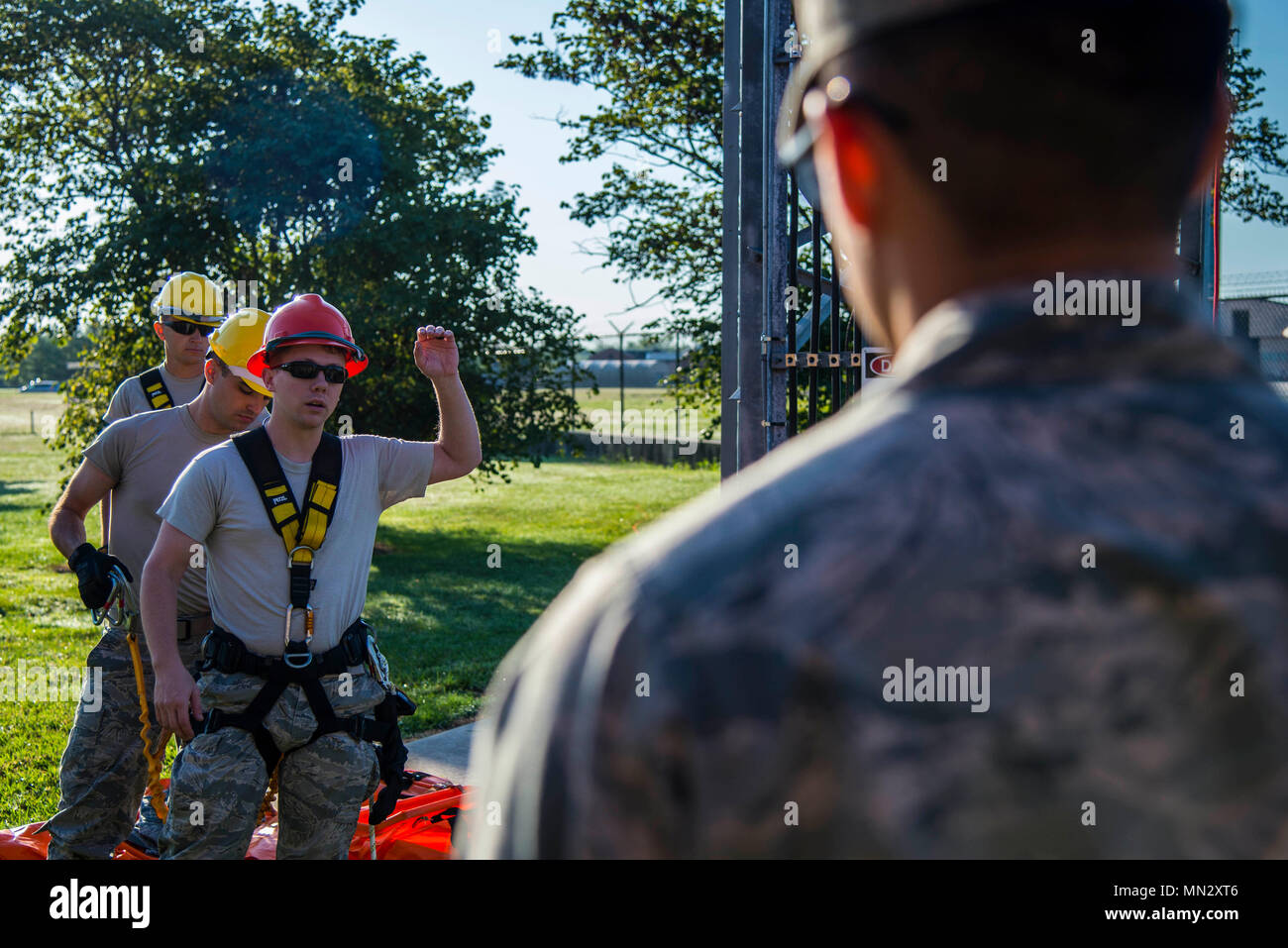 Airmen from the 375th Air Mobility Wing, Communications Squadron cable ...