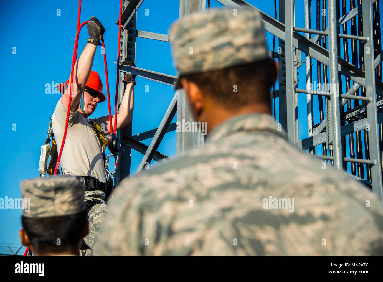 Airmen from the 375th Air Mobility Wing, Communications Squadron cable ...