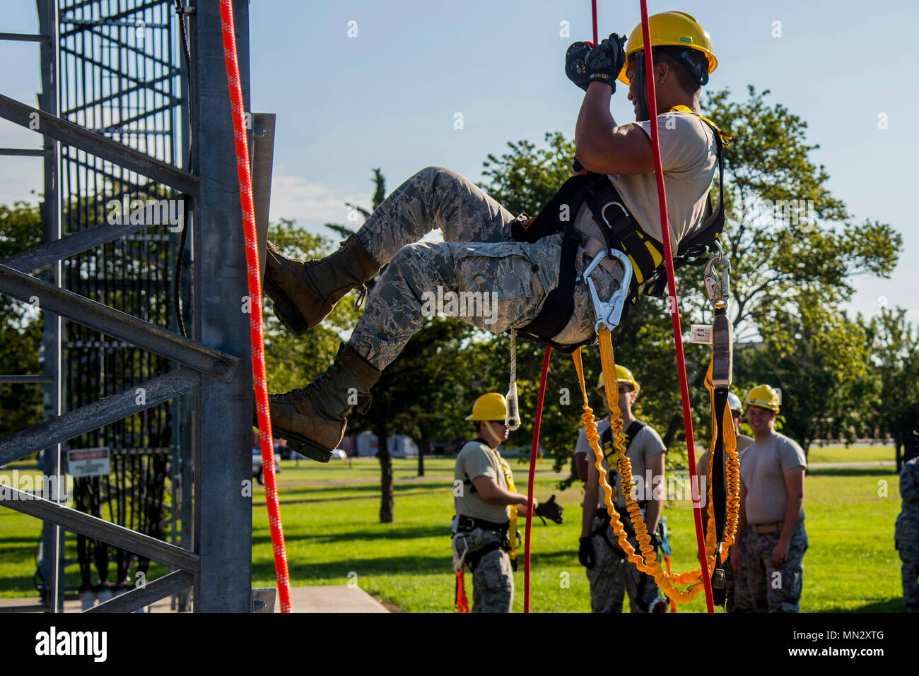 Airmen from the 375th Air Mobility Wing, Communications Squadron cable ...