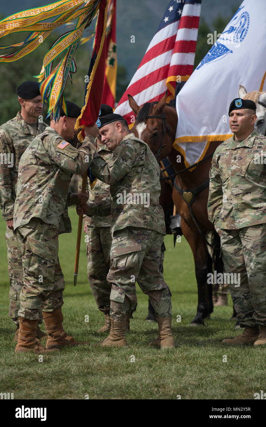 Lt. Gen. Paul E. Funk, III, III Corps commander, receives the colors ...