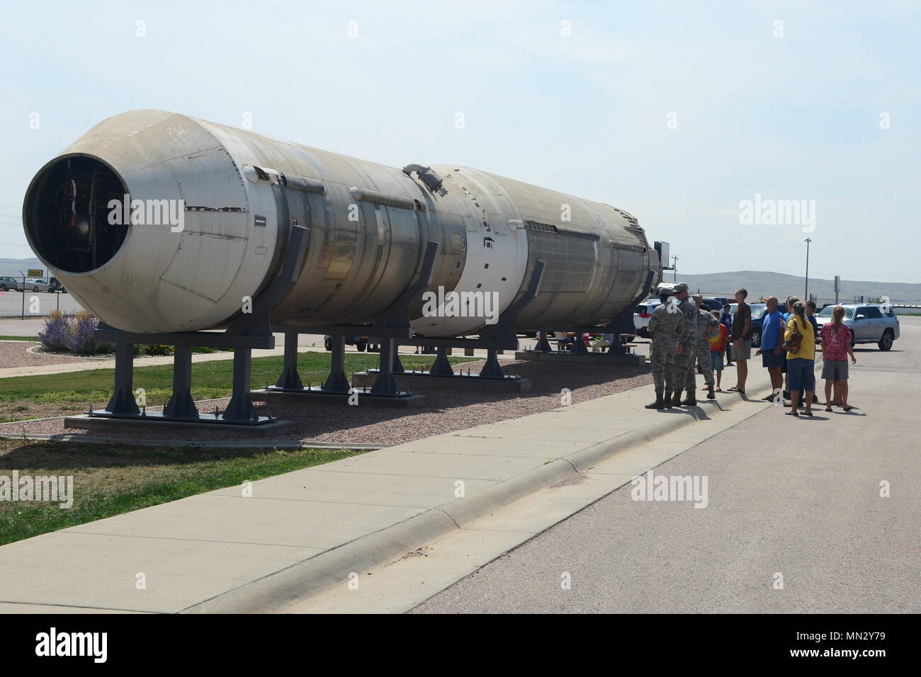 Visitors admire the nearly-finished Titan I Missile display at the ...