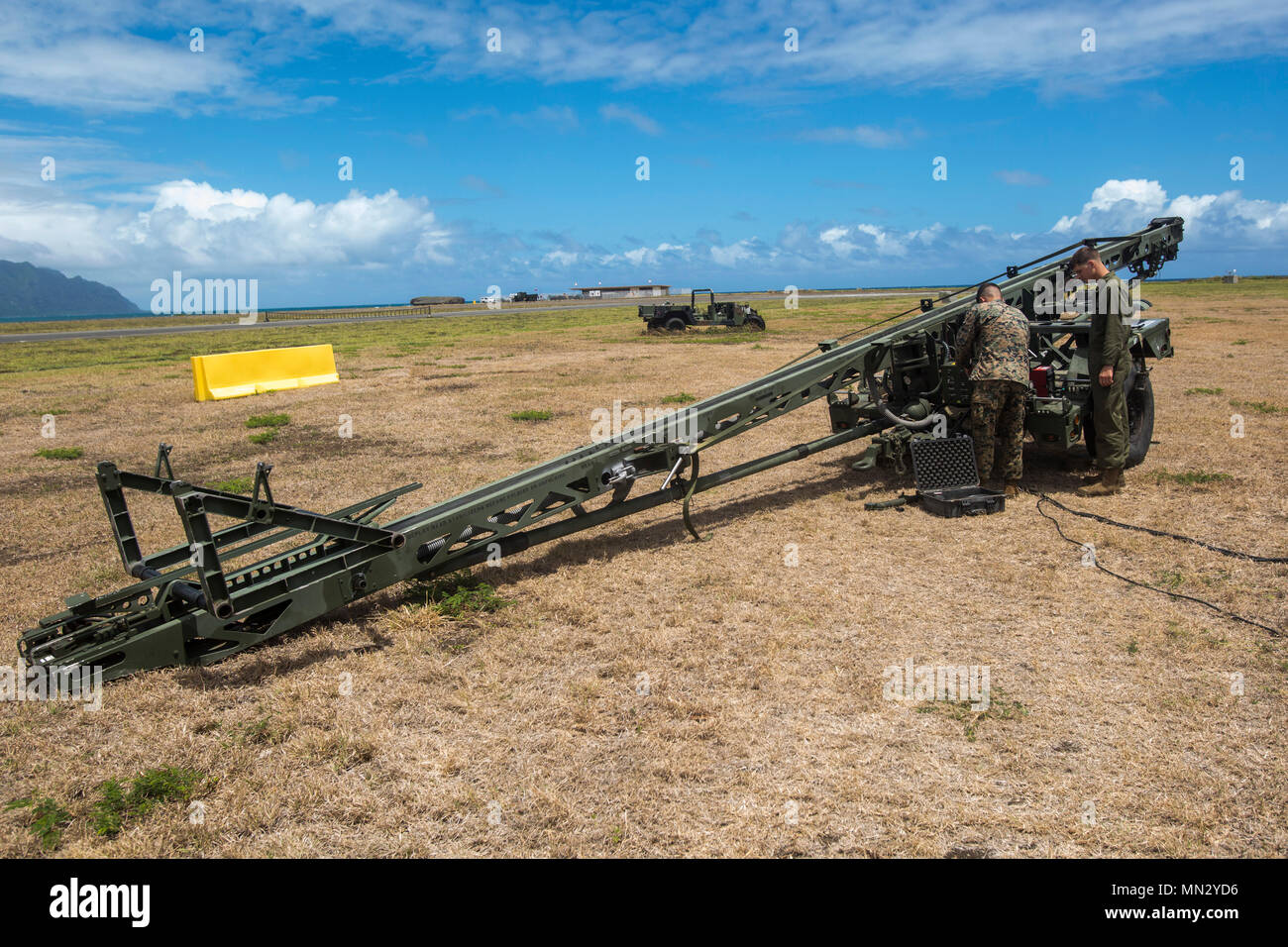 U.S. Marines with Marine Unmanned Aerial Vehicle Squadron 3, prepare an ...