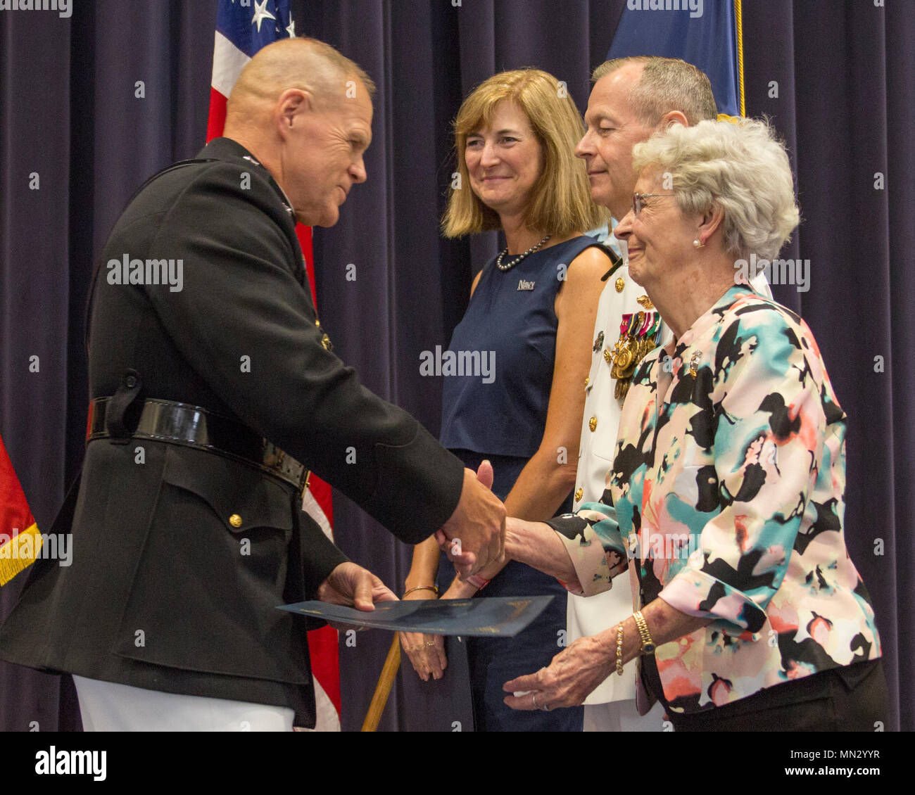 Commandant of the Marine Corps Gen. Robert B. Neller, left, shakes ...