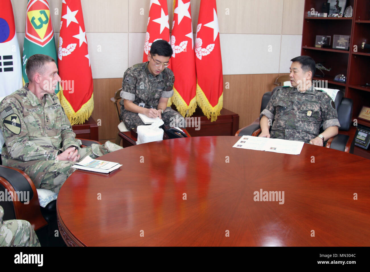 Lt. Gen. Gary Volesky (left), I Corps commanding general, meets with ...
