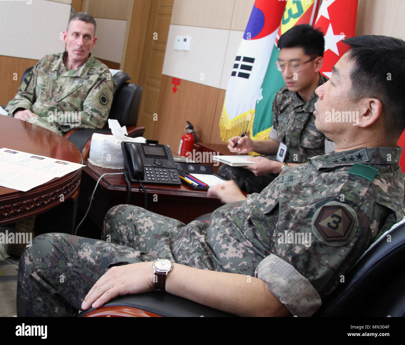 Lt. Gen. Gary Volesky (left), I Corps commanding general, meets with ...