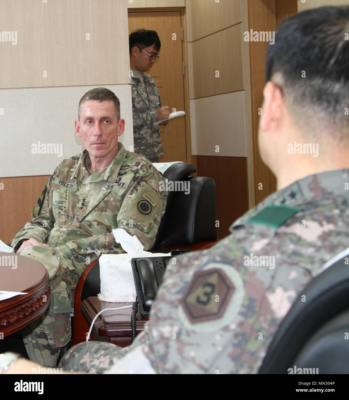Lt. Gen. Gary Volesky (left), I Corps commanding general, meets with ...