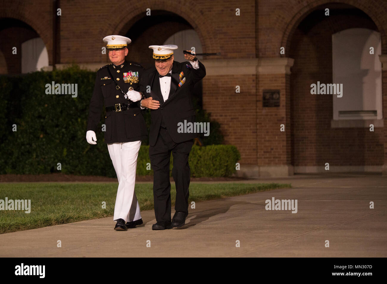World War II veteran Col. Archie “Hap” Simpson is escorted to his seat ...